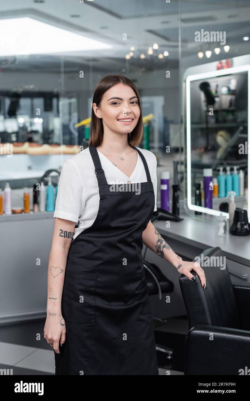 Woman in hairdresser chair hi-res stock photography and images - Alamy