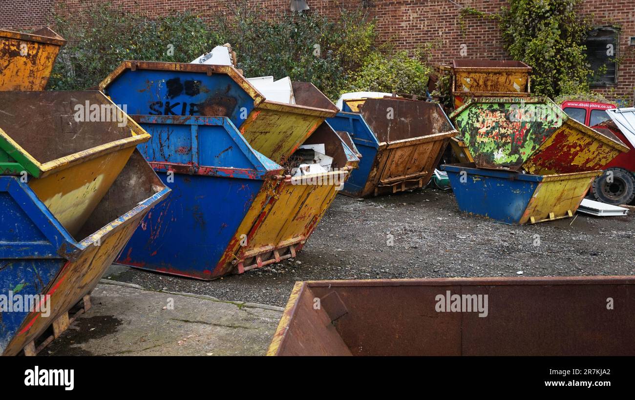 Colourful view of skips on an industrial estate, in a jumble, good ...