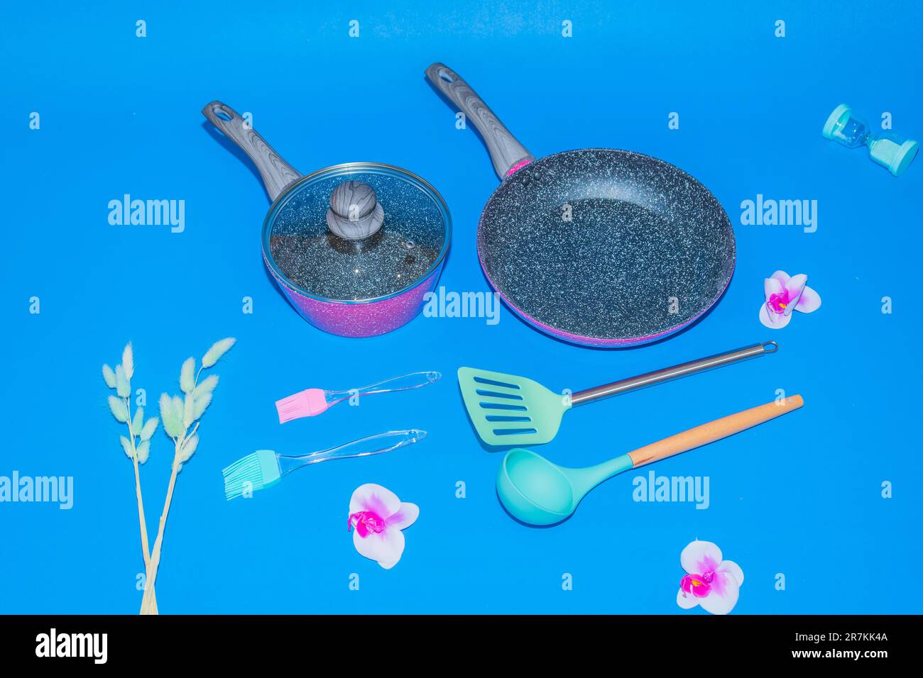 The "Pretty in Pink: Cooking Essentials in Stunning Hues" collection ...
