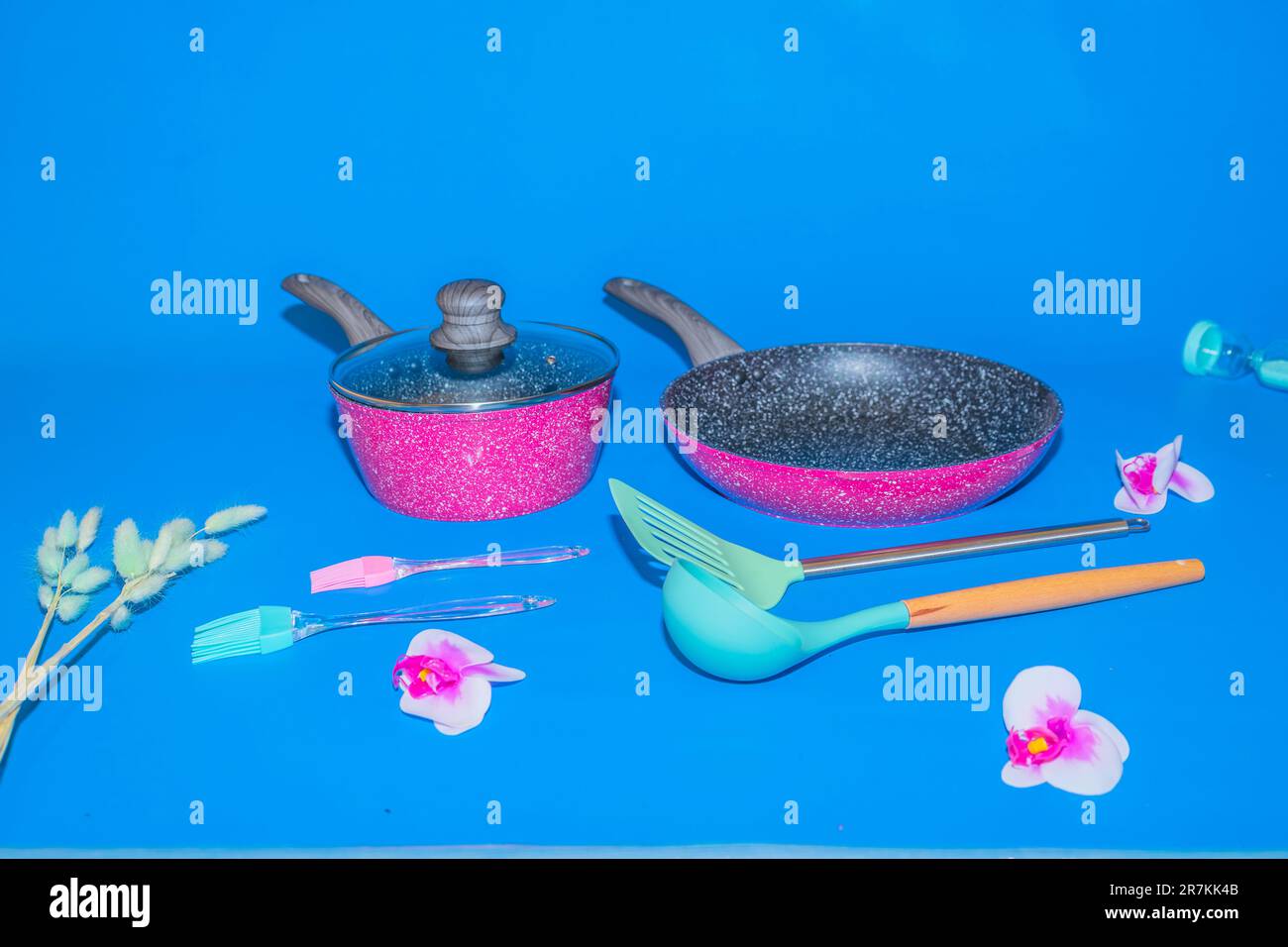 The "Pretty in Pink: Cooking Essentials in Stunning Hues" collection ...