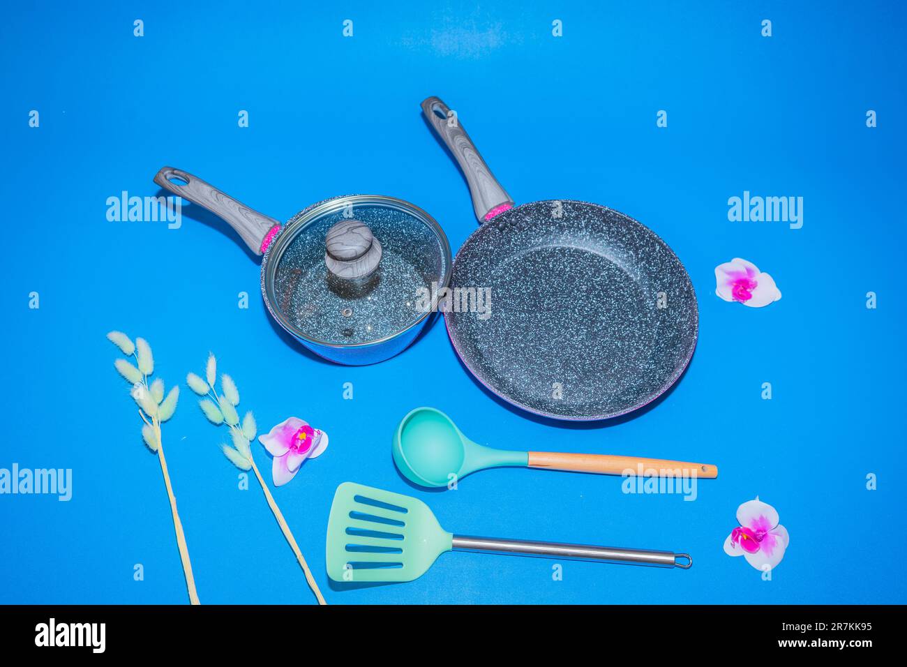 The "Pretty in Pink: Cooking Essentials in Stunning Hues" collection ...