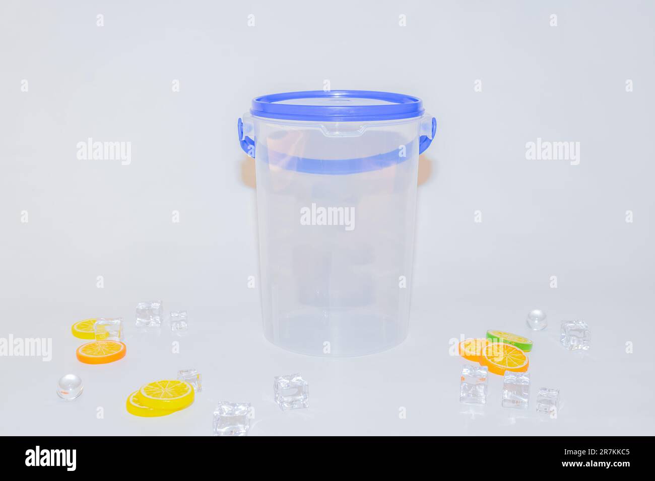 The Versatile Blue Plastic Cylinder Container with Lid is a practical ...