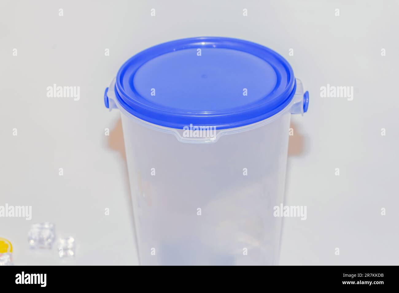 The Versatile Blue Plastic Cylinder Container with Lid is a practical ...
