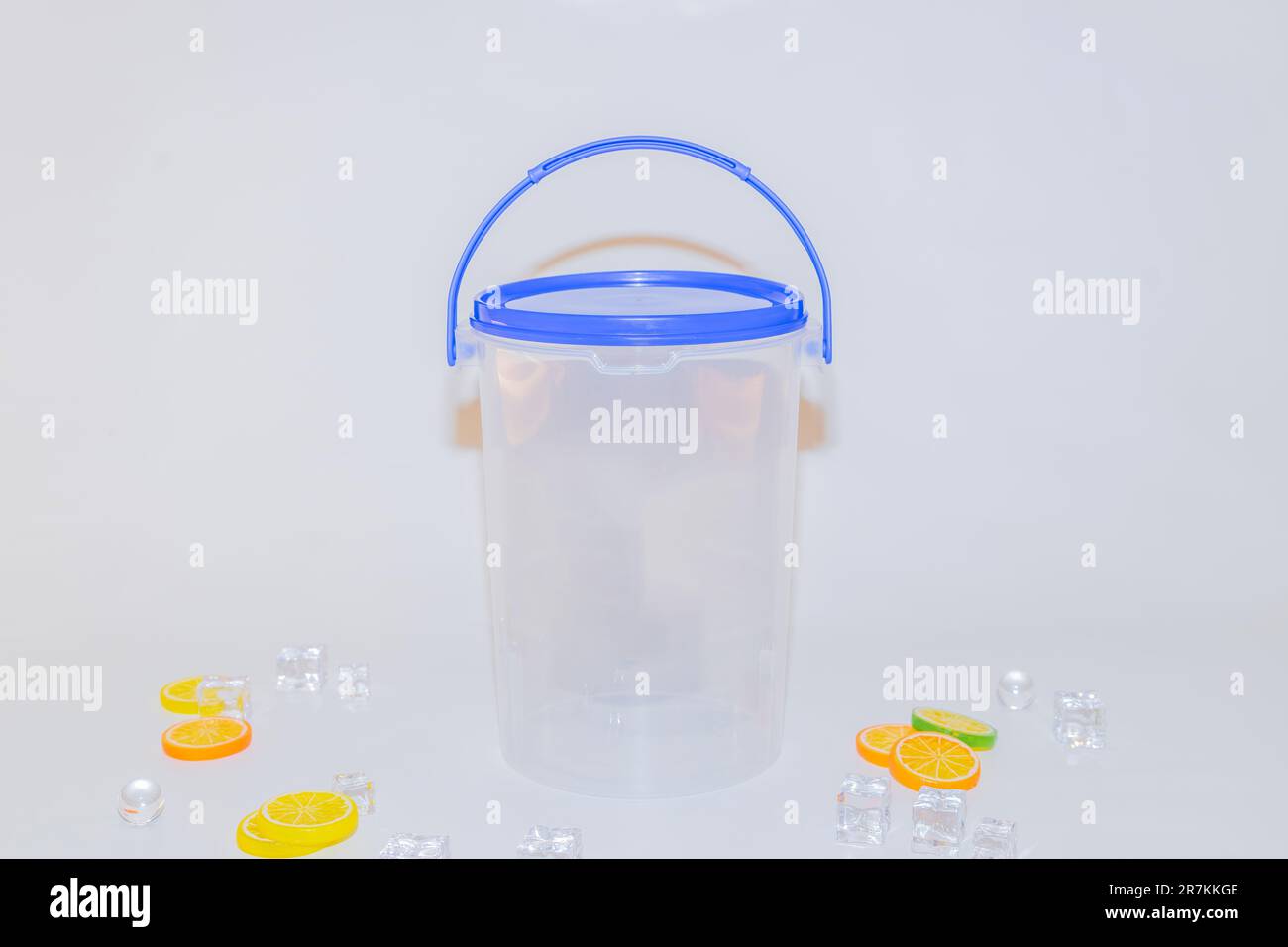 The Versatile Blue Plastic Cylinder Container with Lid is a practical ...