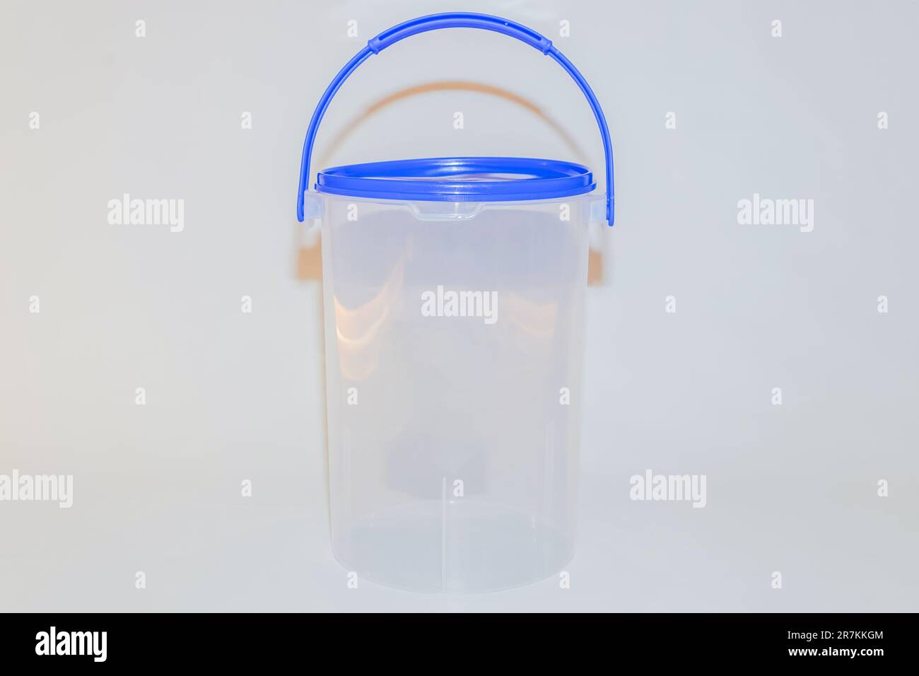 The Versatile Blue Plastic Cylinder Container with Lid is a practical ...