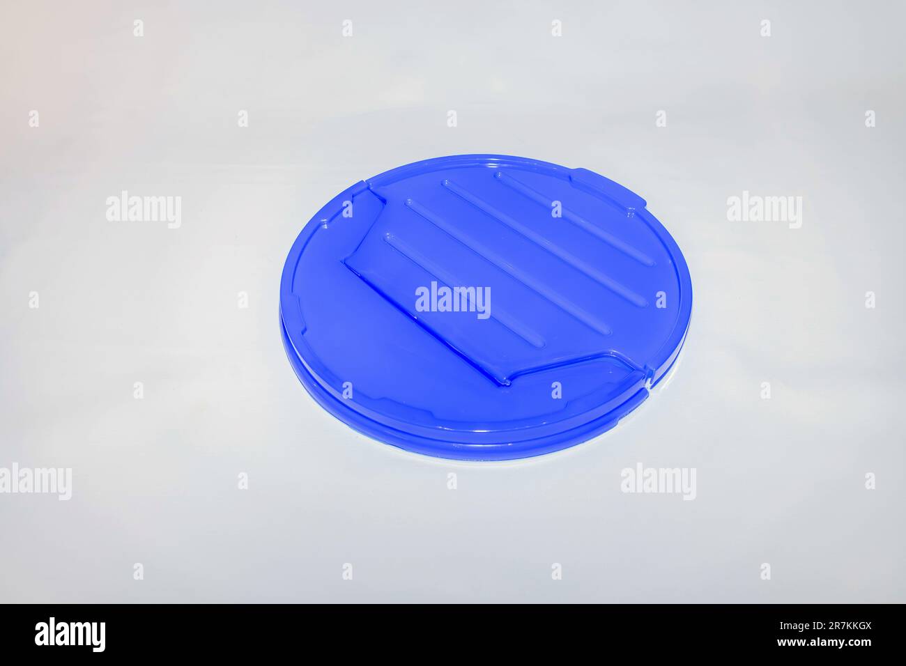 The Versatile Blue Plastic Cylinder Container with Lid is a practical ...