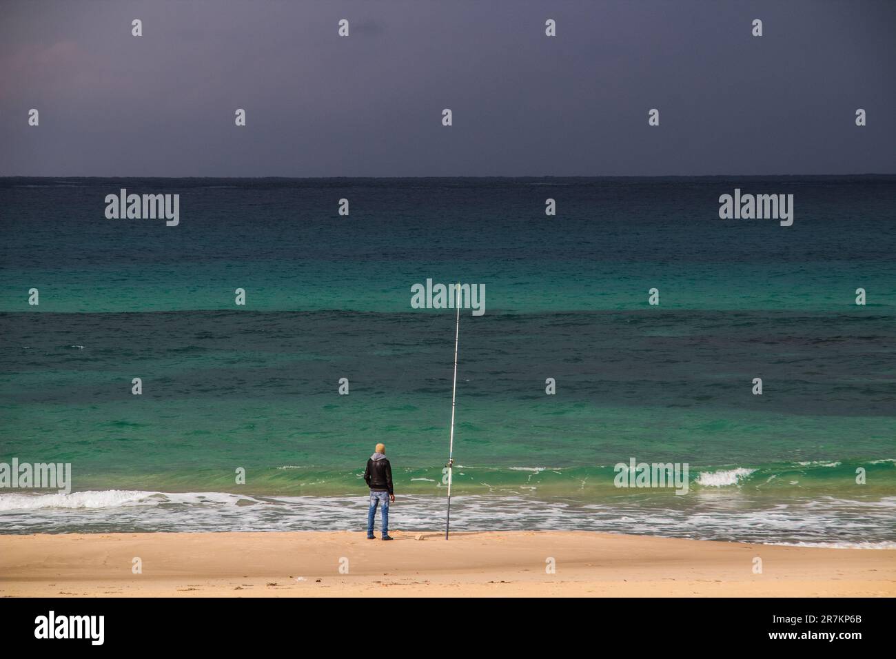 Fisherman with Fishing Rod on Cap Serrat Beach, Bizerte, Tunisia Stock ...