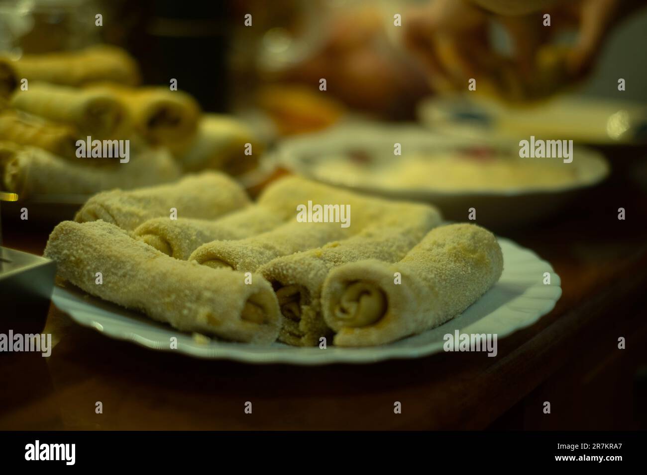 An array of freshly prepared food is displayed on a table, including a ...