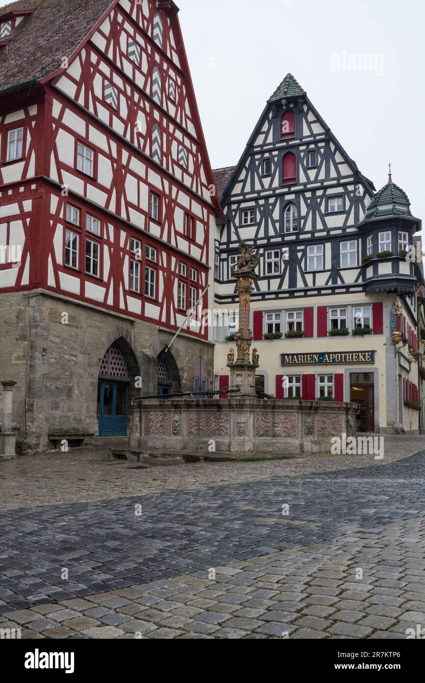 Traditional half-timbered German houses in Marktplatz, Rothenburg ob ...