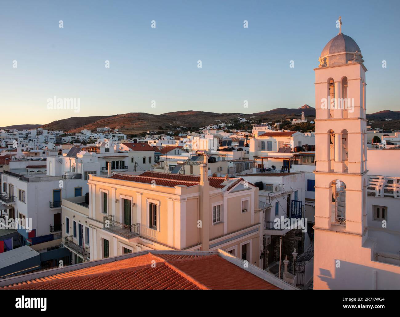 Tinos island Chora town Cyclades Greece. Last sunbeam colors Panagia ...