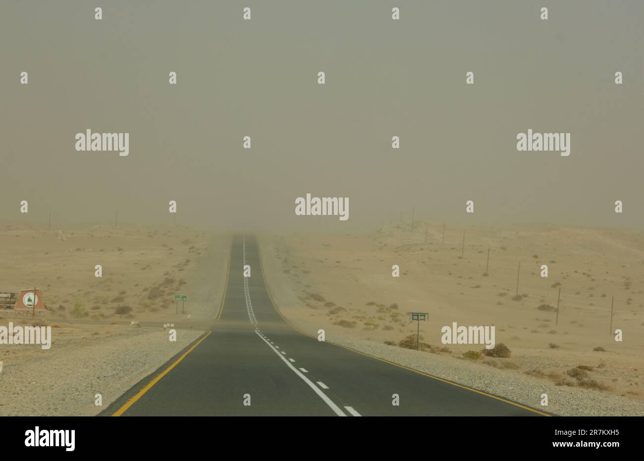 Sand storm on a Namibian road near Walvis Bay, Skeleton Coast, Namibia ...