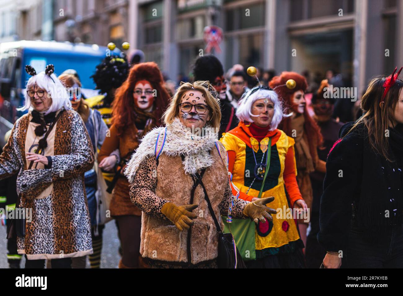 A group of people in vibrant and exciting costumes celebrating the ...