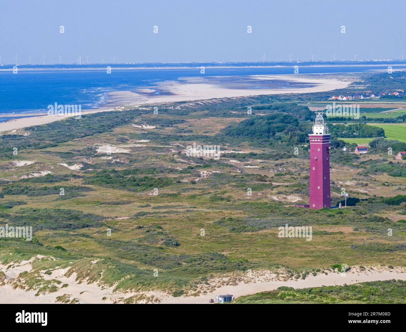 Drone picture of Ouddorp lighthouse in Holland with surrounding dunes ...