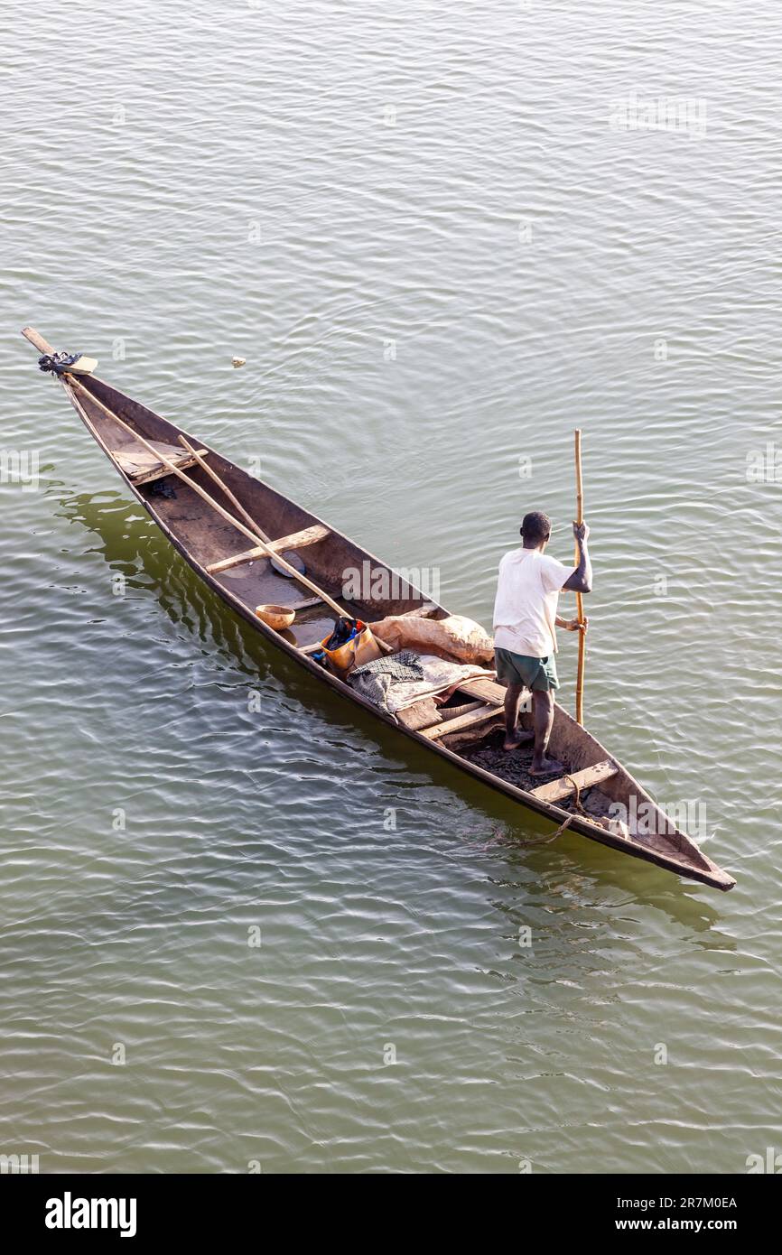 Fisherman on his canoe fishing on the Niger River in Bamako, Mali Stock ...