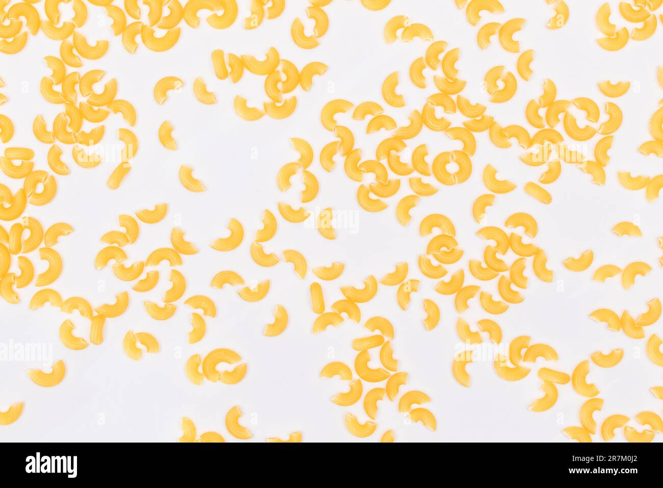 Scattered Uncooked Chifferi Rigati Pasta on White Background. Fat and ...