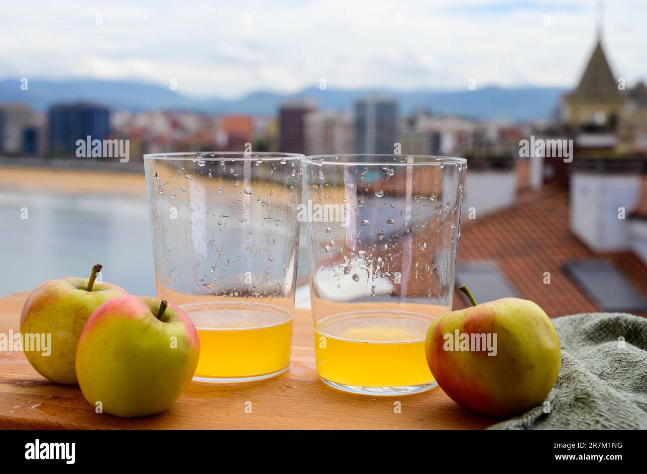 Traditional natural Asturian cider made from fermented apples in wooden ...