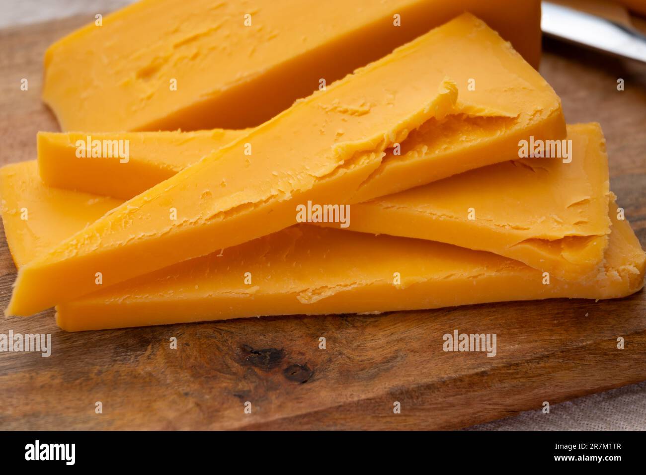Cheese collection, piece of matured British yellow cheddar cheese made ...