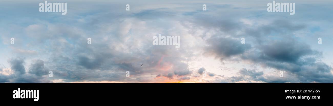Dramatic sunset sky panorama with bright glowing red pink Cumulus ...