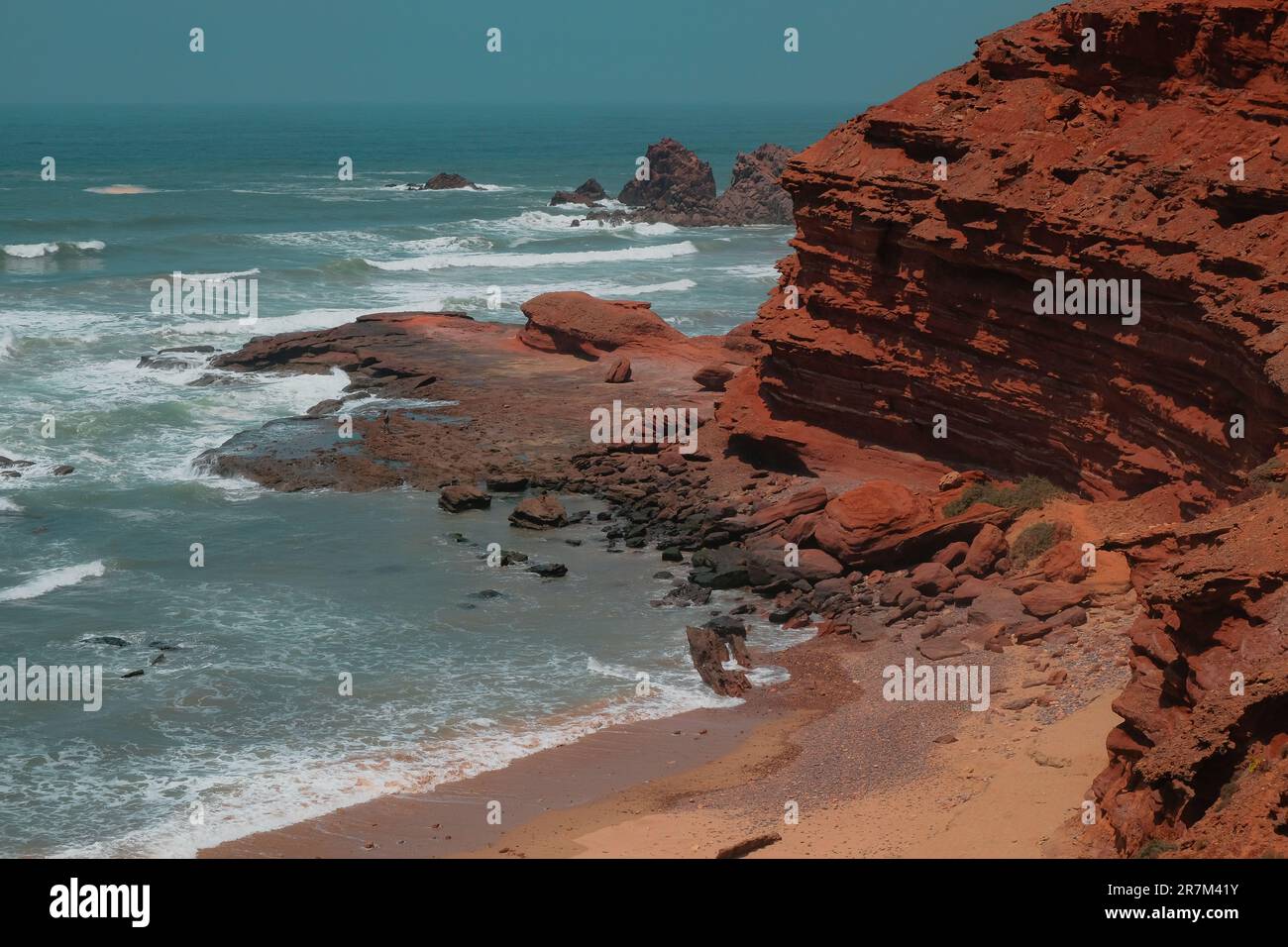 Aerial view of sandstone cliffs in Legzira Beach. Rugged coastline in ...