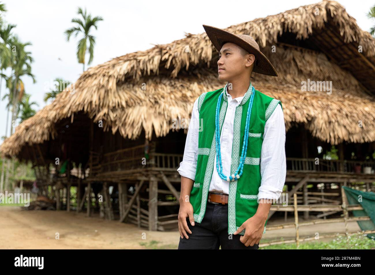 Man from galo tribe in traditional clothes with traditional hat on his ...