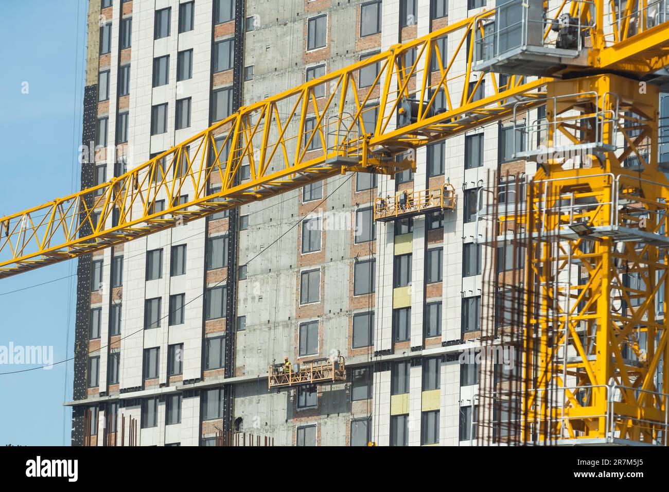 construction of modern multi-storey buildings. workers in the ...