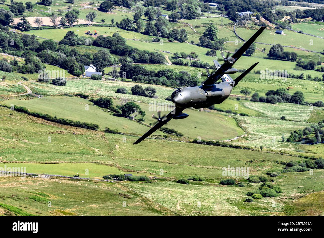 three RAF Hercules C130 pass through The Mach Loop in North Wales as ...