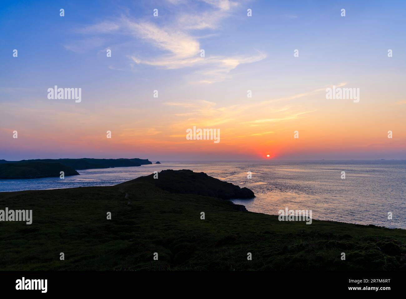 Sunset over the rugged coast of Wooltack Bay from Wooltack Point on ...
