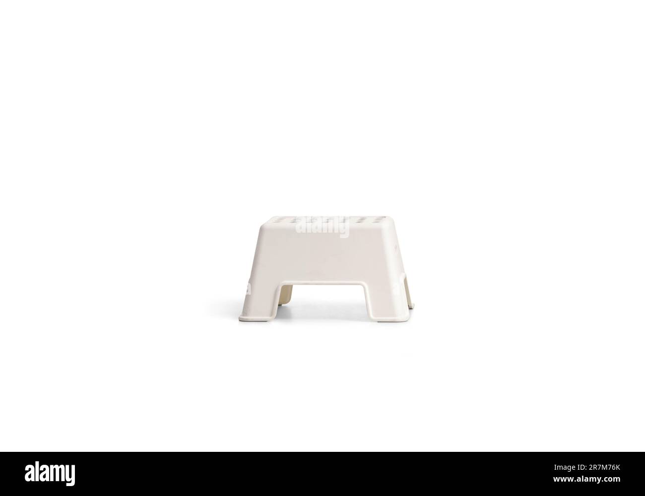 Studio shot of a small white plastic chair isolated on white background ...