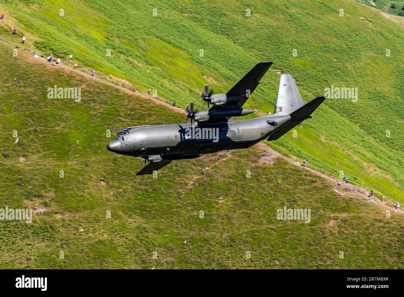 three RAF Hercules C130 pass through The Mach Loop in North Wales as ...