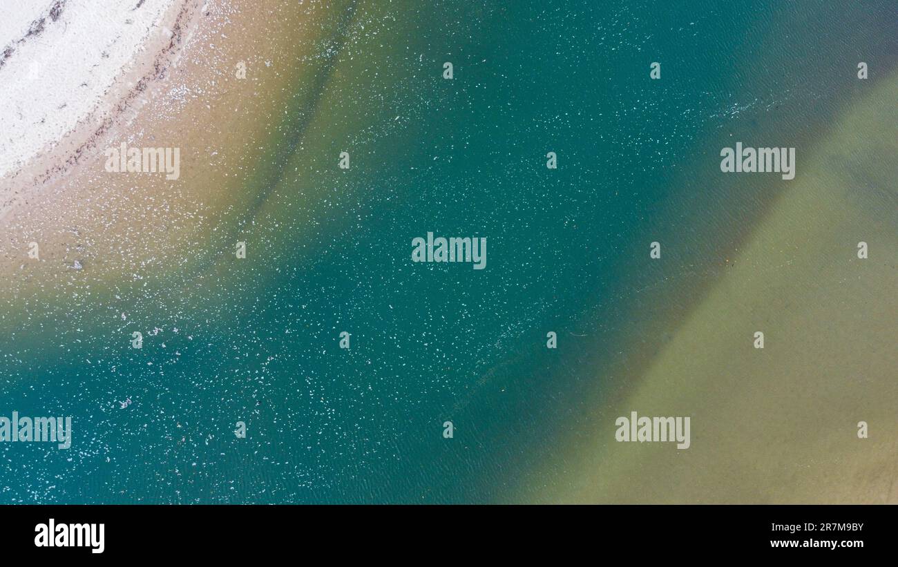 Aerial photo with drone of the river and sea meeting Stock Photo - Alamy