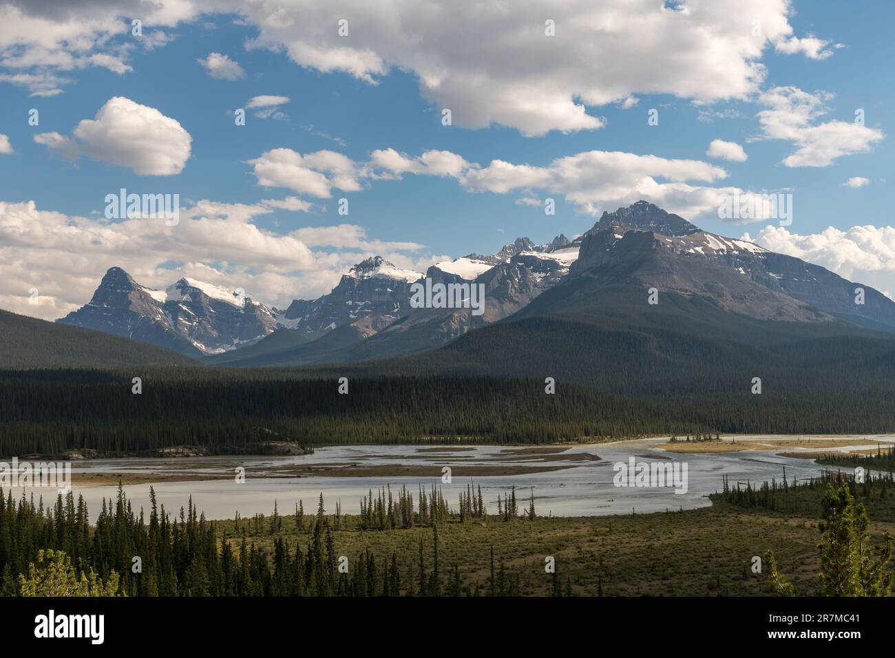 Surrounded by majestic mountains and lush evergreen forest hi-res stock photography and images ...