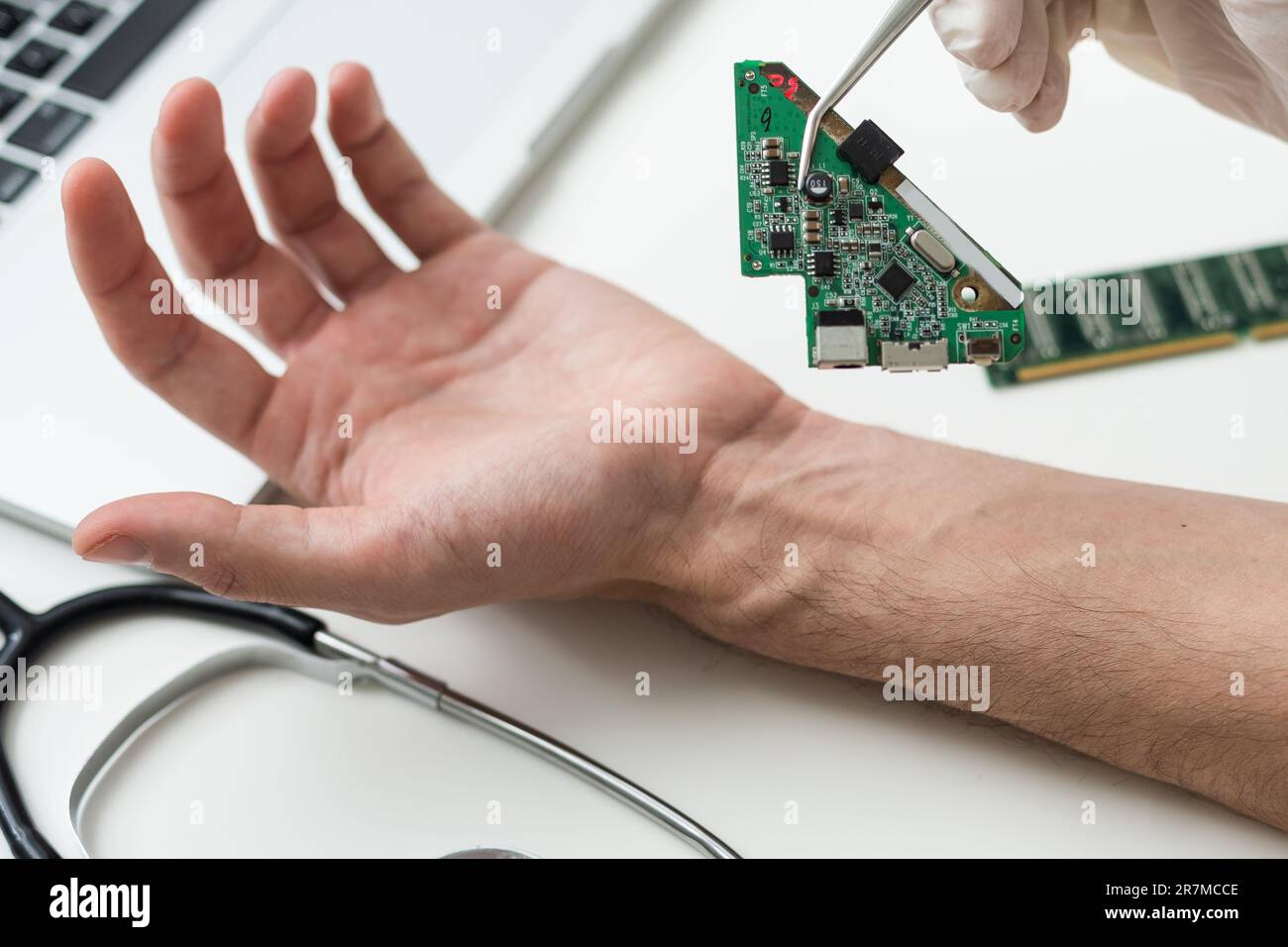 High angle of anonymous medical practitioner in gloves using modern ...