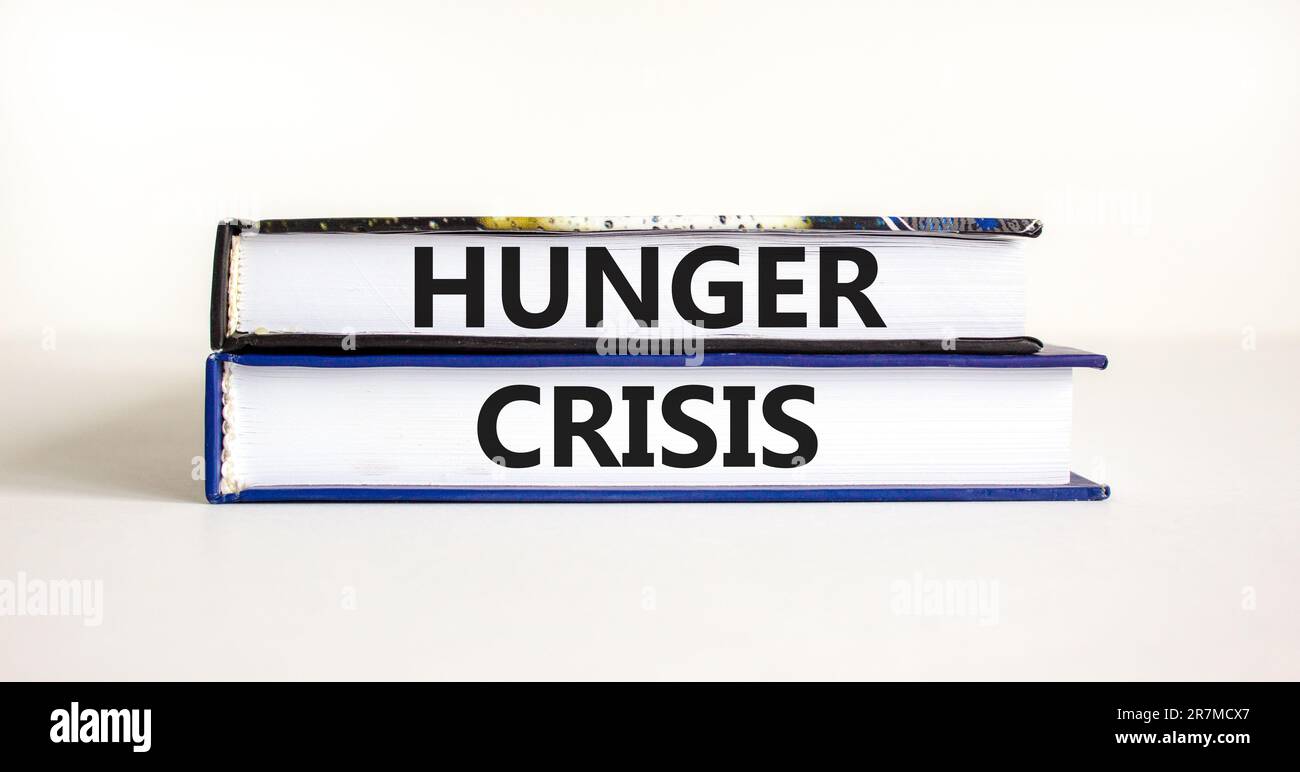 Hunger crisis symbol. Concept words Hunger crisis on beautiful books on ...