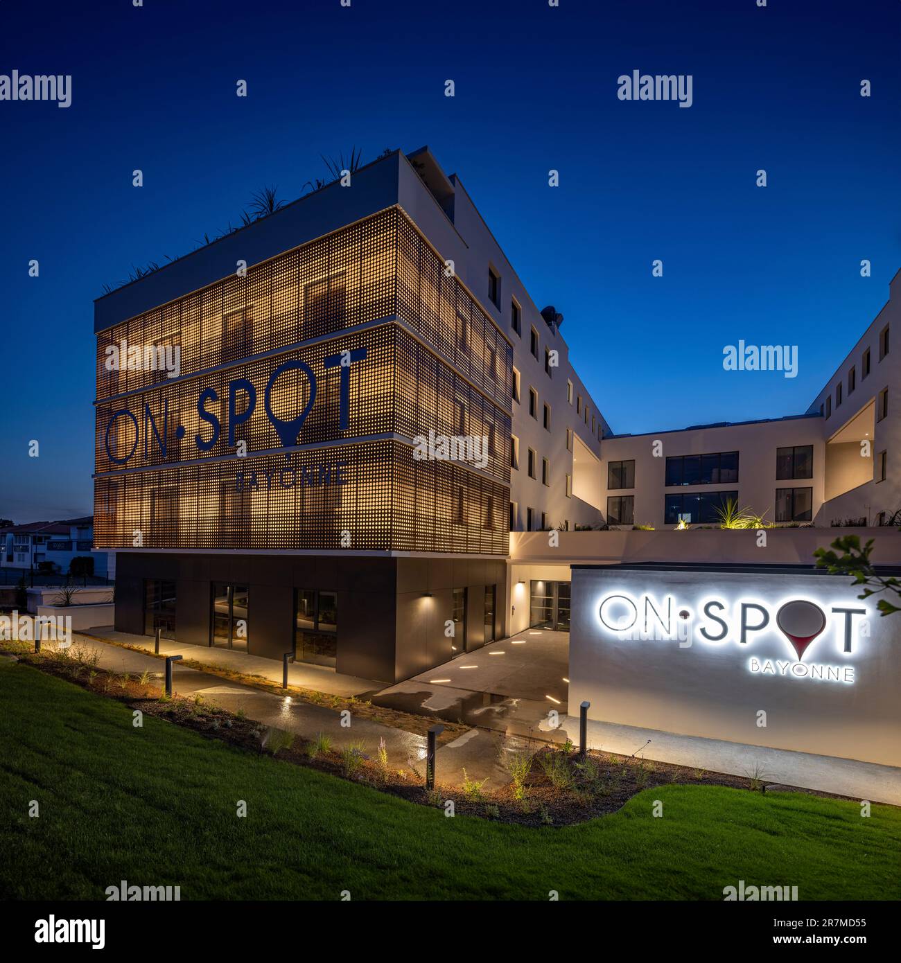 Night view of the ON SPOT Bayonne construction, office building with ...