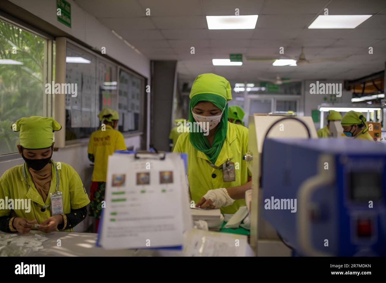 Ready-made garments (RMG) workers working in a LEED Certified Green ...