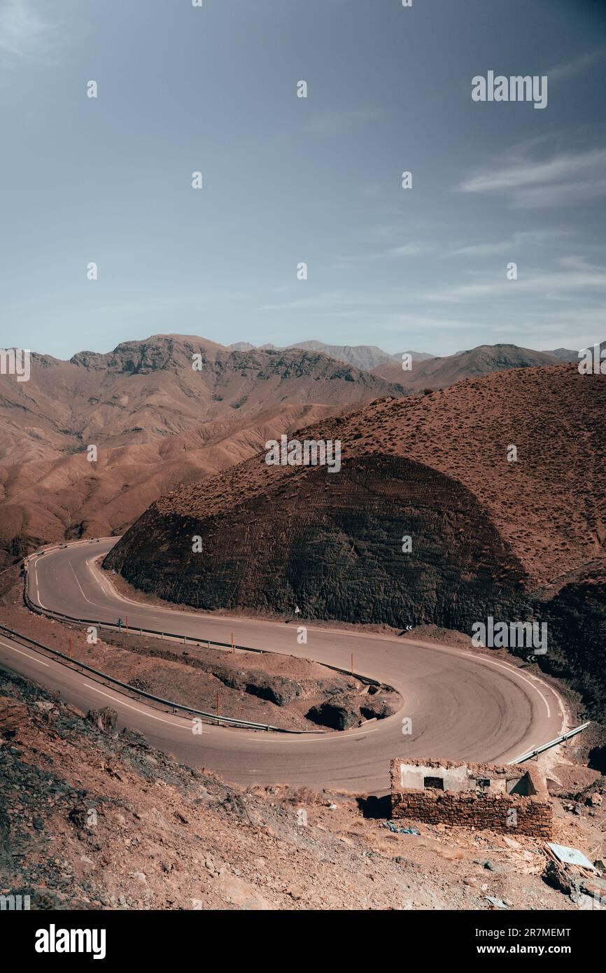Curving through Atlas mountains, an intricate road winds, revealing the ...