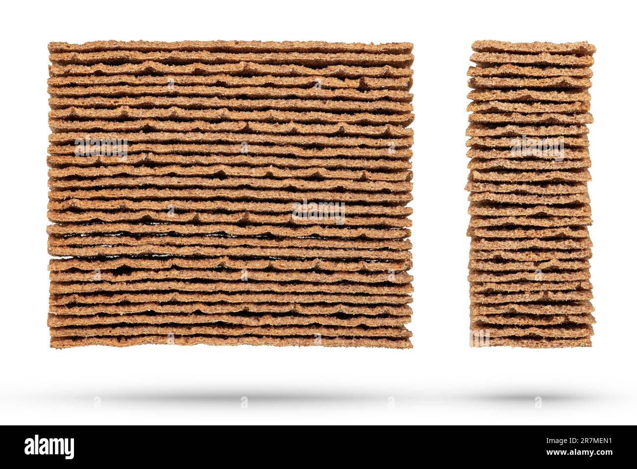 Texture of rye chips on a white background. The chips are stacked one ...
