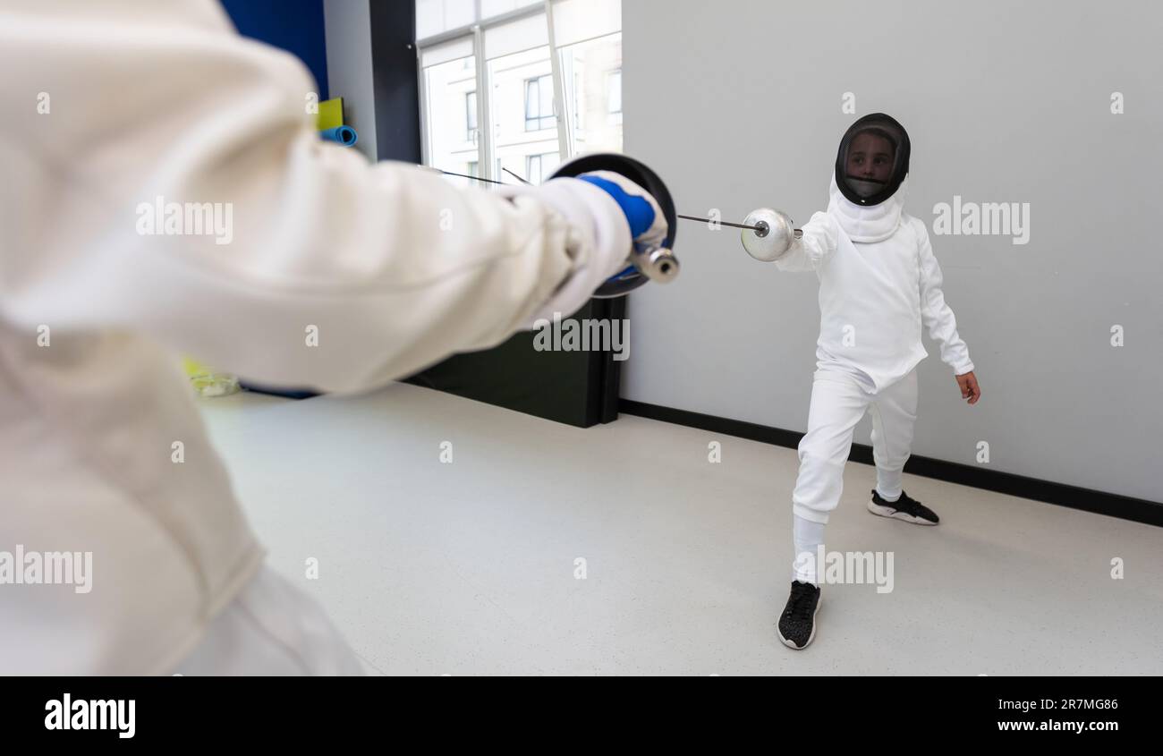Two fencers man woman fencing hi-res stock photography and images - Alamy