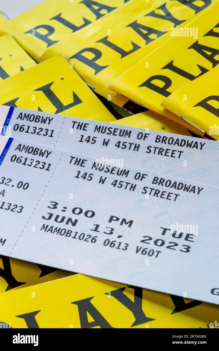 Still life of entry tickets to the Museum of Broadway on a bed ...