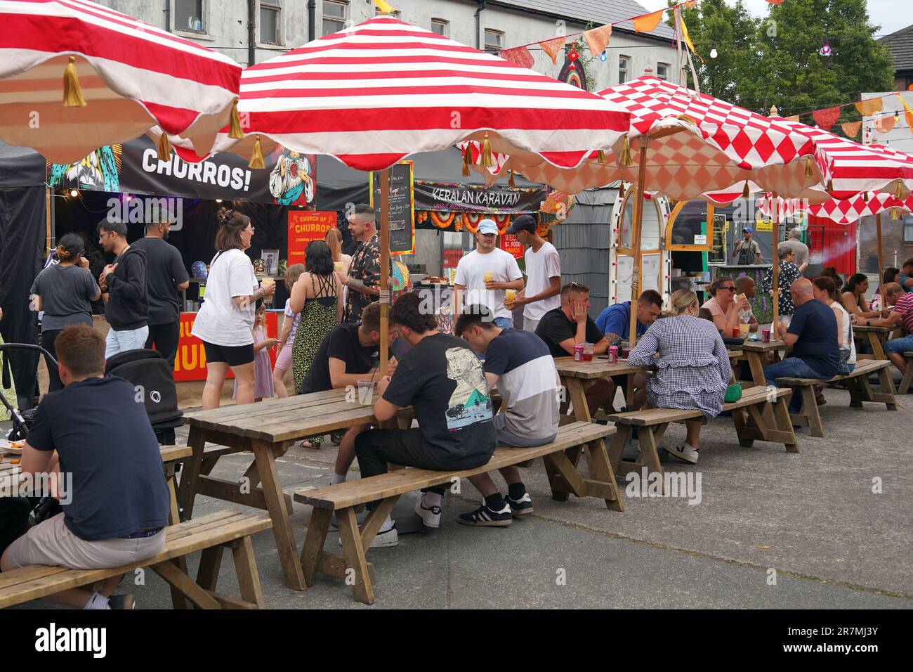 Crowds of young people enjoying the Street Food Circus, Roath Yard ...