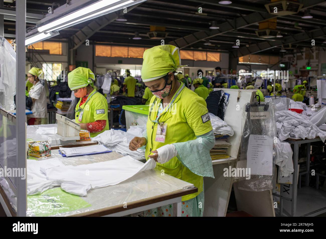 Ready-made garments (RMG) workers working in a LEED Certified Green ...