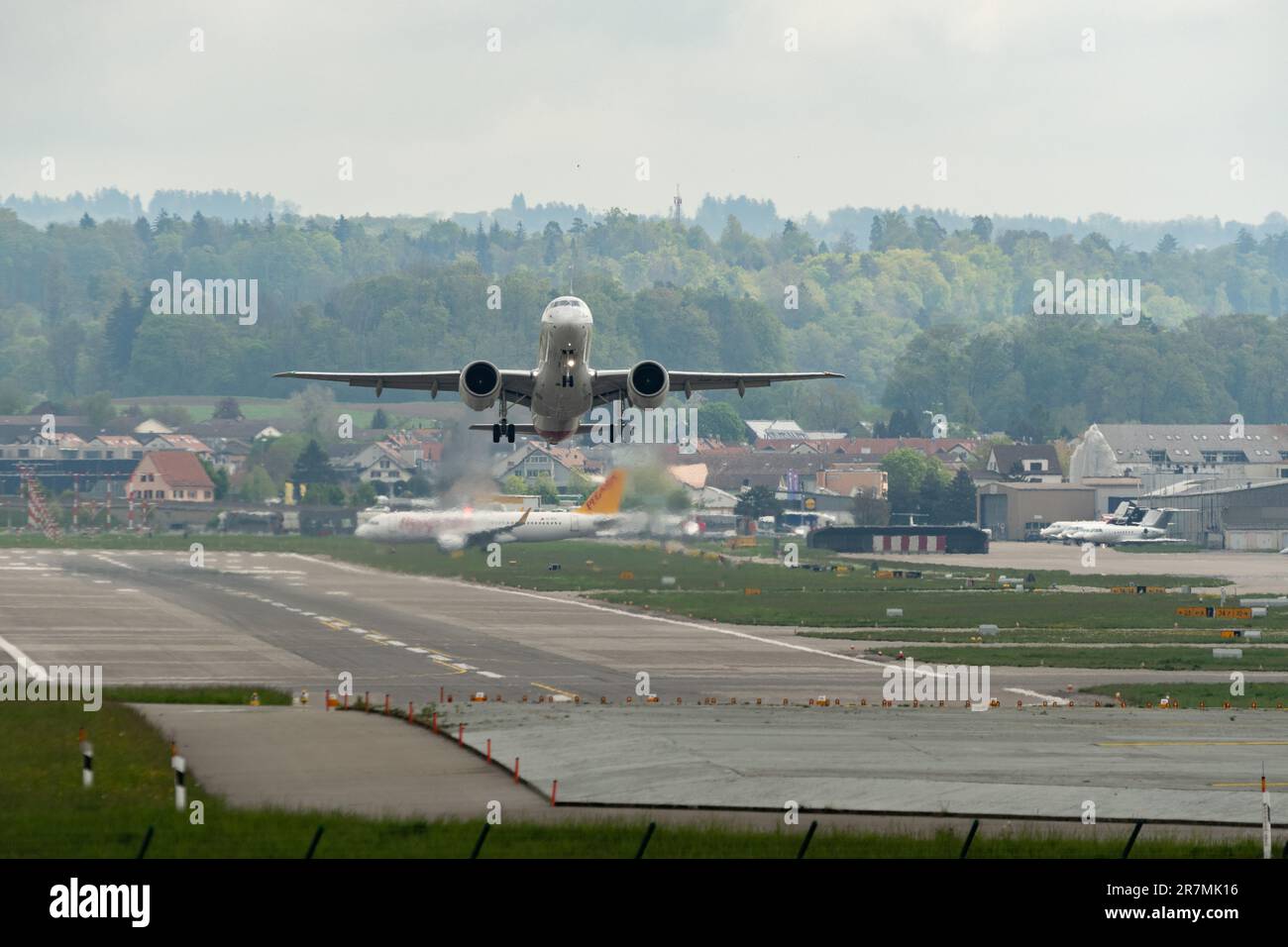 Zurich, Switzerland, May 2, 2023 HB-AZC Helvetic Airways Embraer E190 ...
