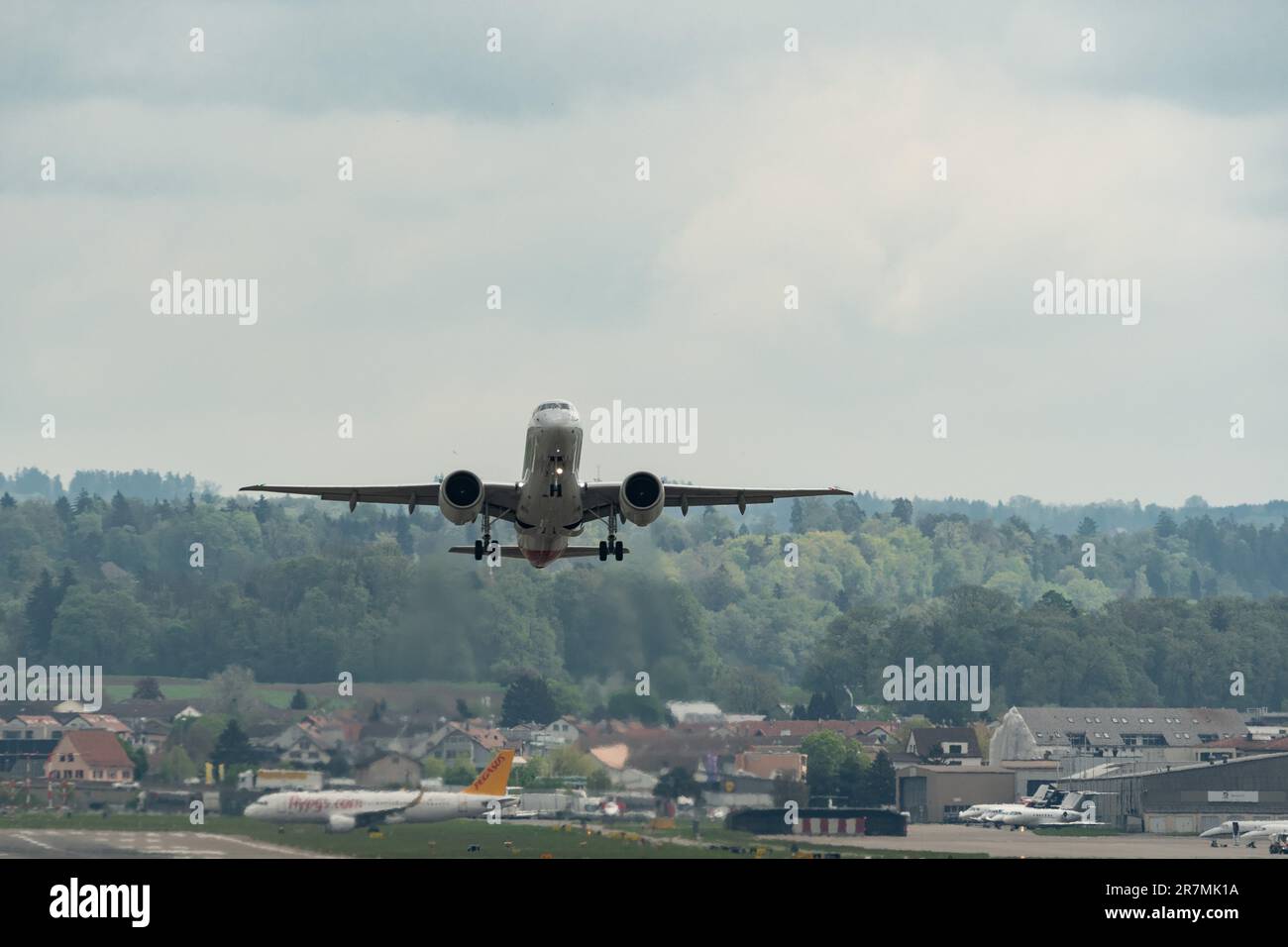 Zurich, Switzerland, May 2, 2023 HB-AZC Helvetic Airways Embraer E190 ...