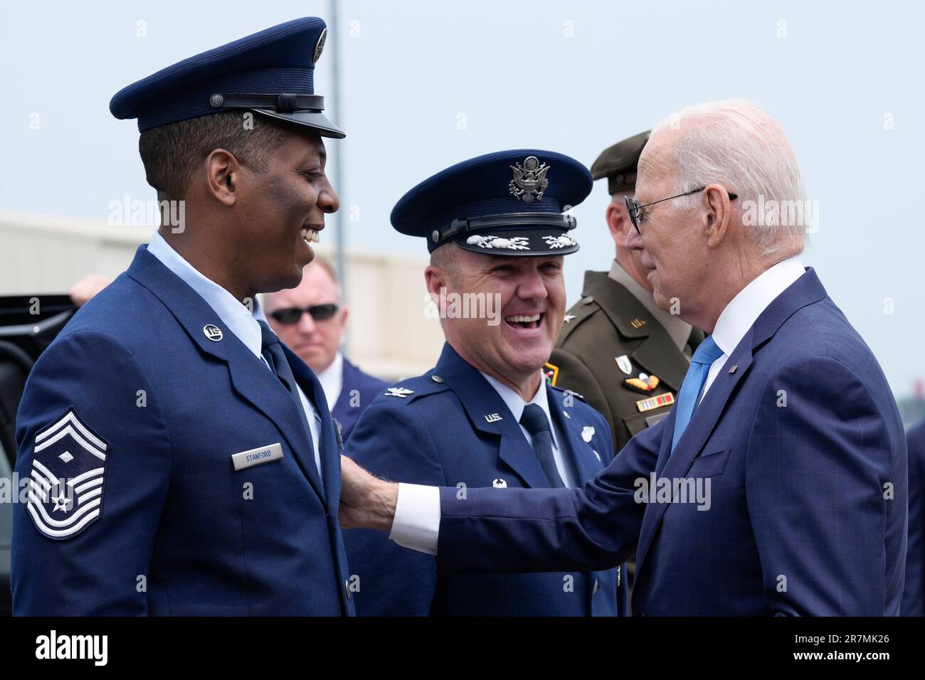 President Joe Biden is greeted by Senior Master Sgt. Joe Stanford ...