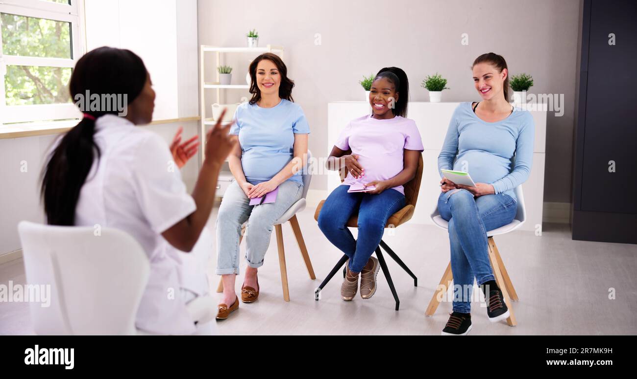 Prenatal Trainer Class. Young Women Pregnancy And Parenthood Stock ...
