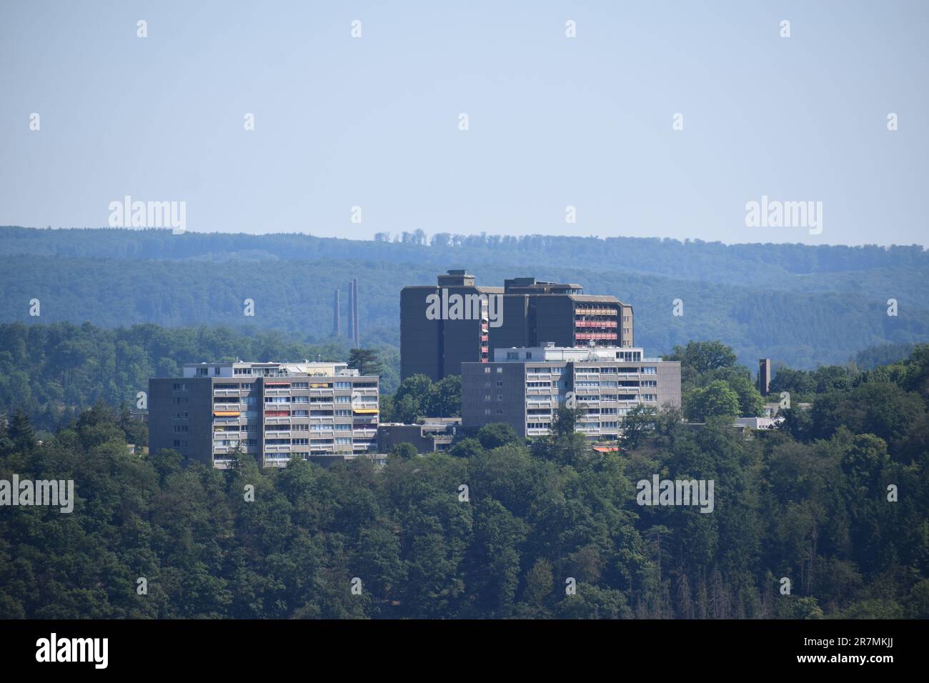 Huge hospital on a hill outside the town Stock Photo - Alamy