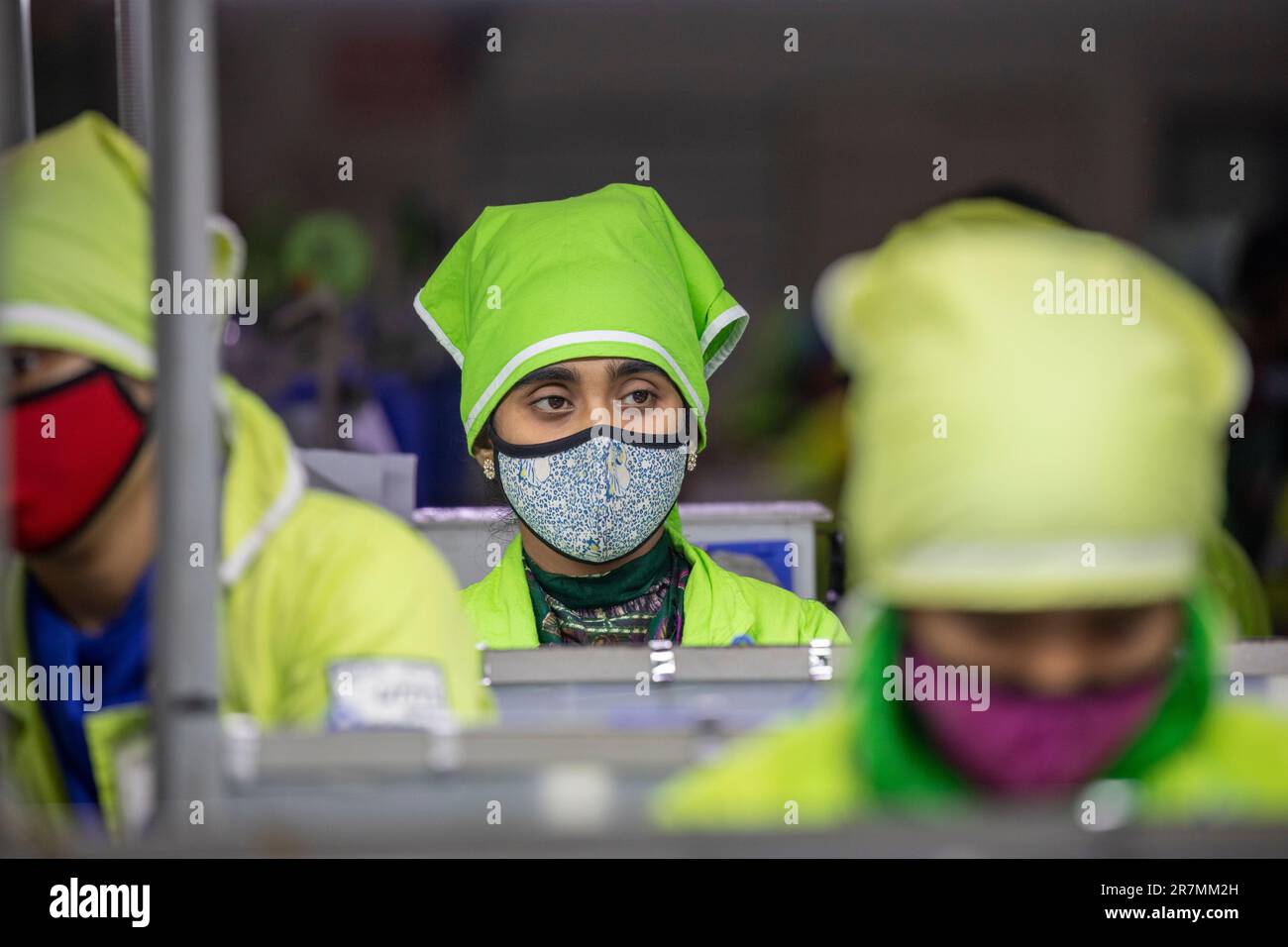 Ready-made garments (RMG) workers working in a LEED Certified Green ...
