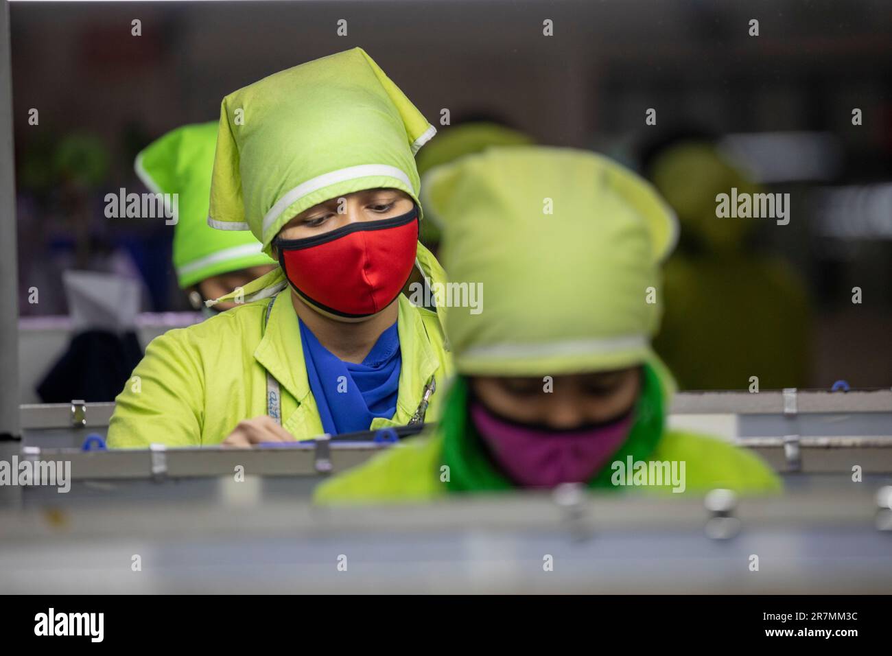 Ready-made garments (RMG) workers working in a LEED Certified Green ...