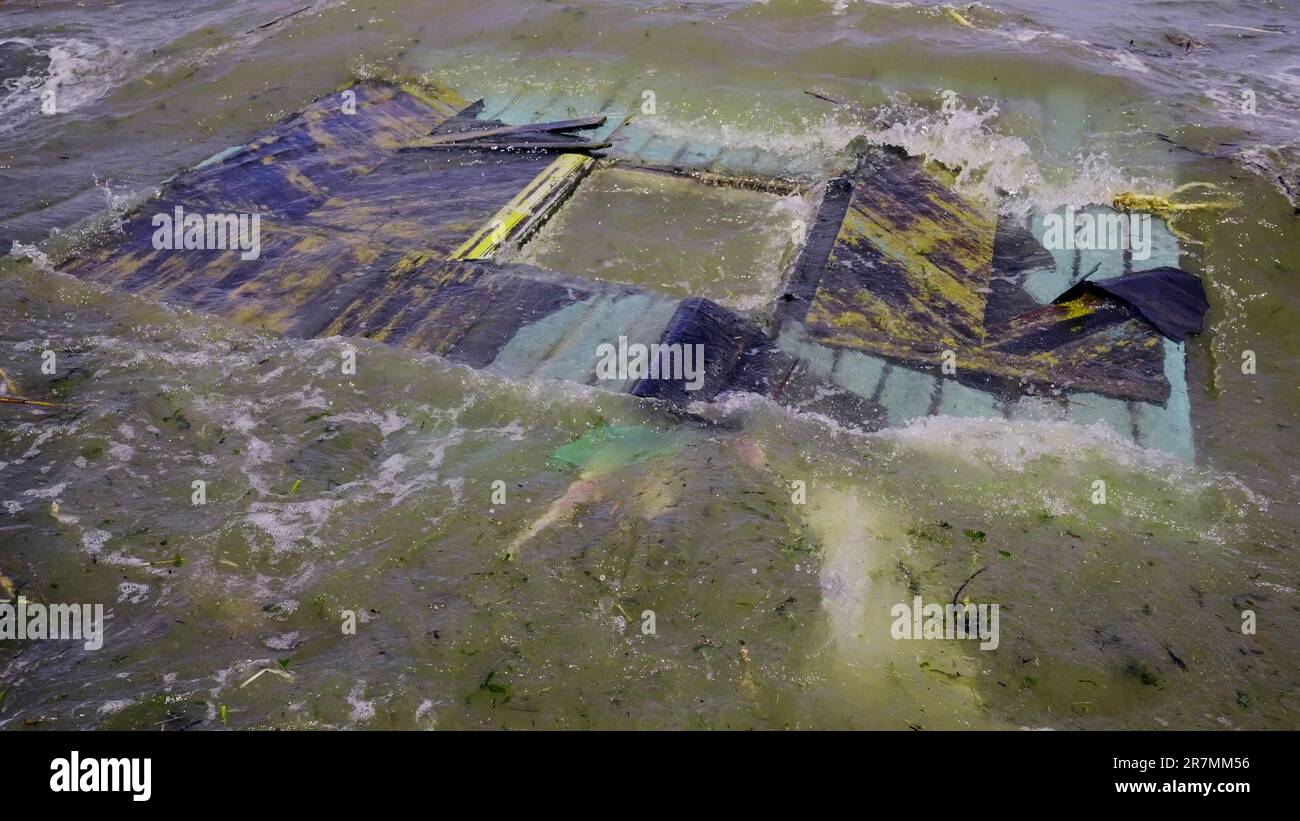 Part of wall of house floats near shore, floating debris has reached ...