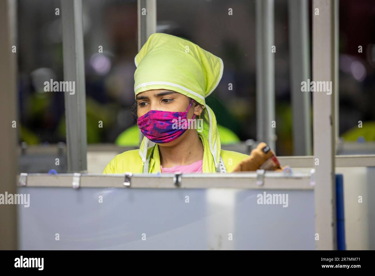 Ready-made garments (RMG) workers working in a LEED Certified Green ...